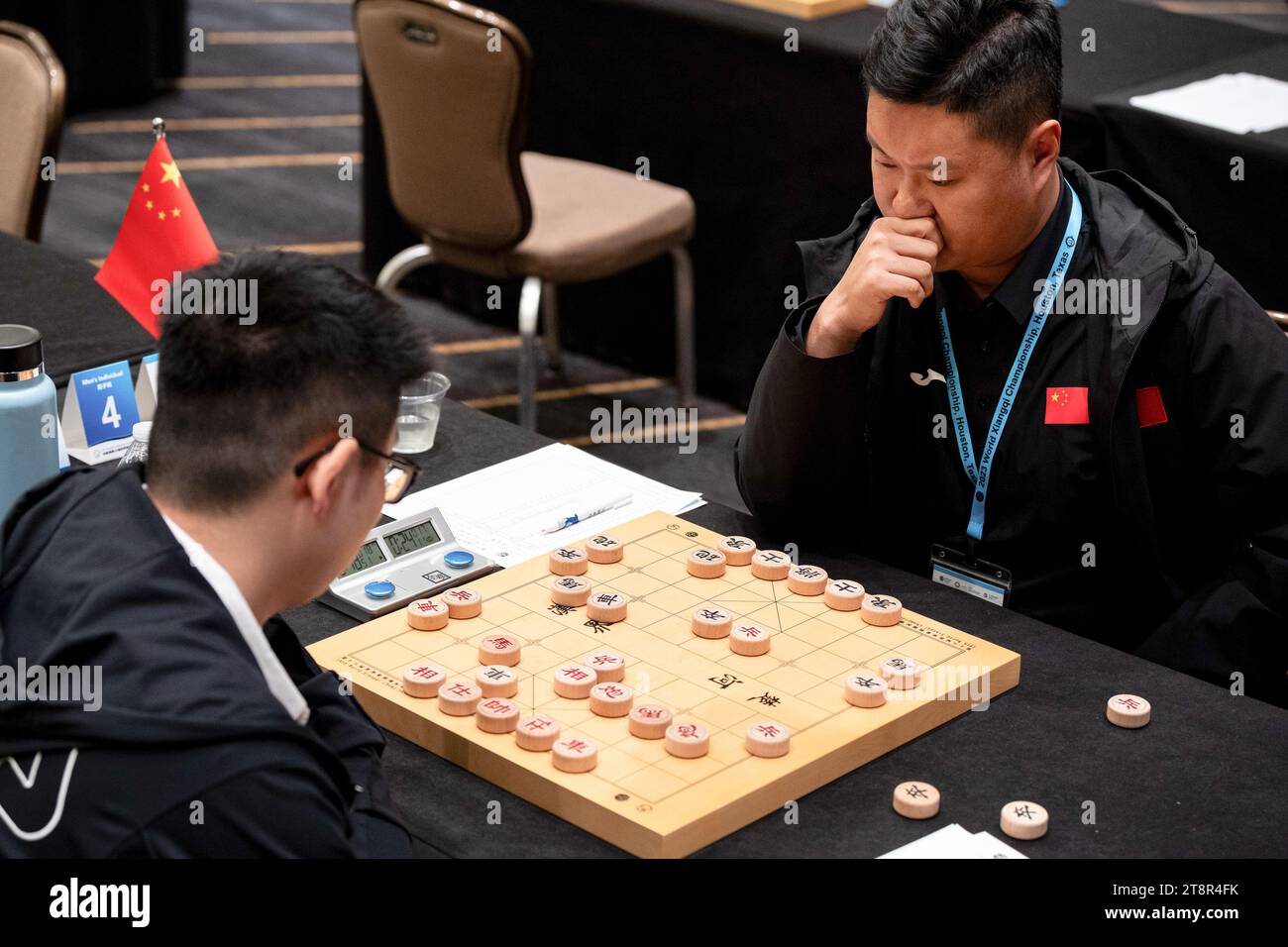 Houston, USA. 20th Nov, 2023. Meng Chen (R) of China competes against ...