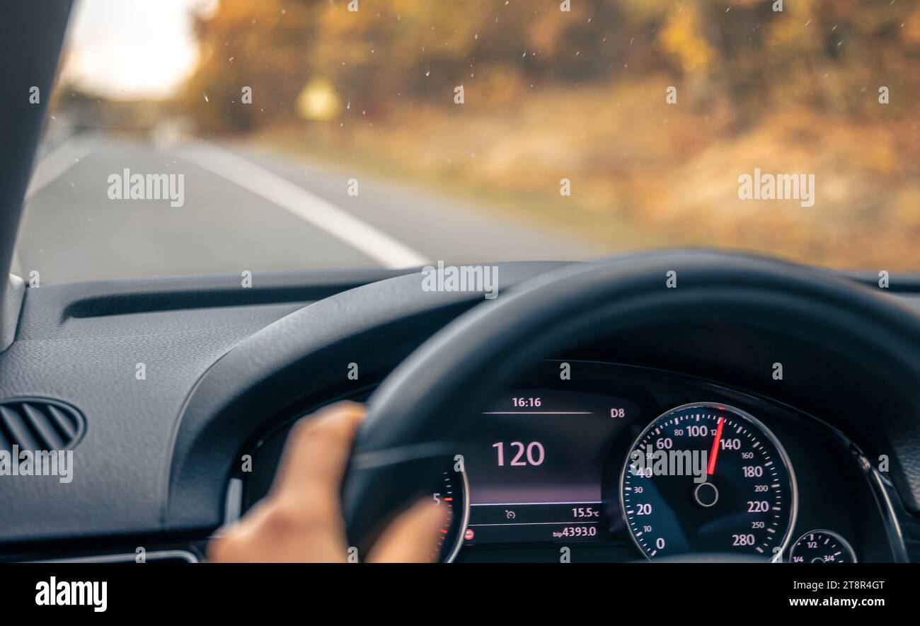 Steering wheel in a car close up, high speed driving on the road Stock ...