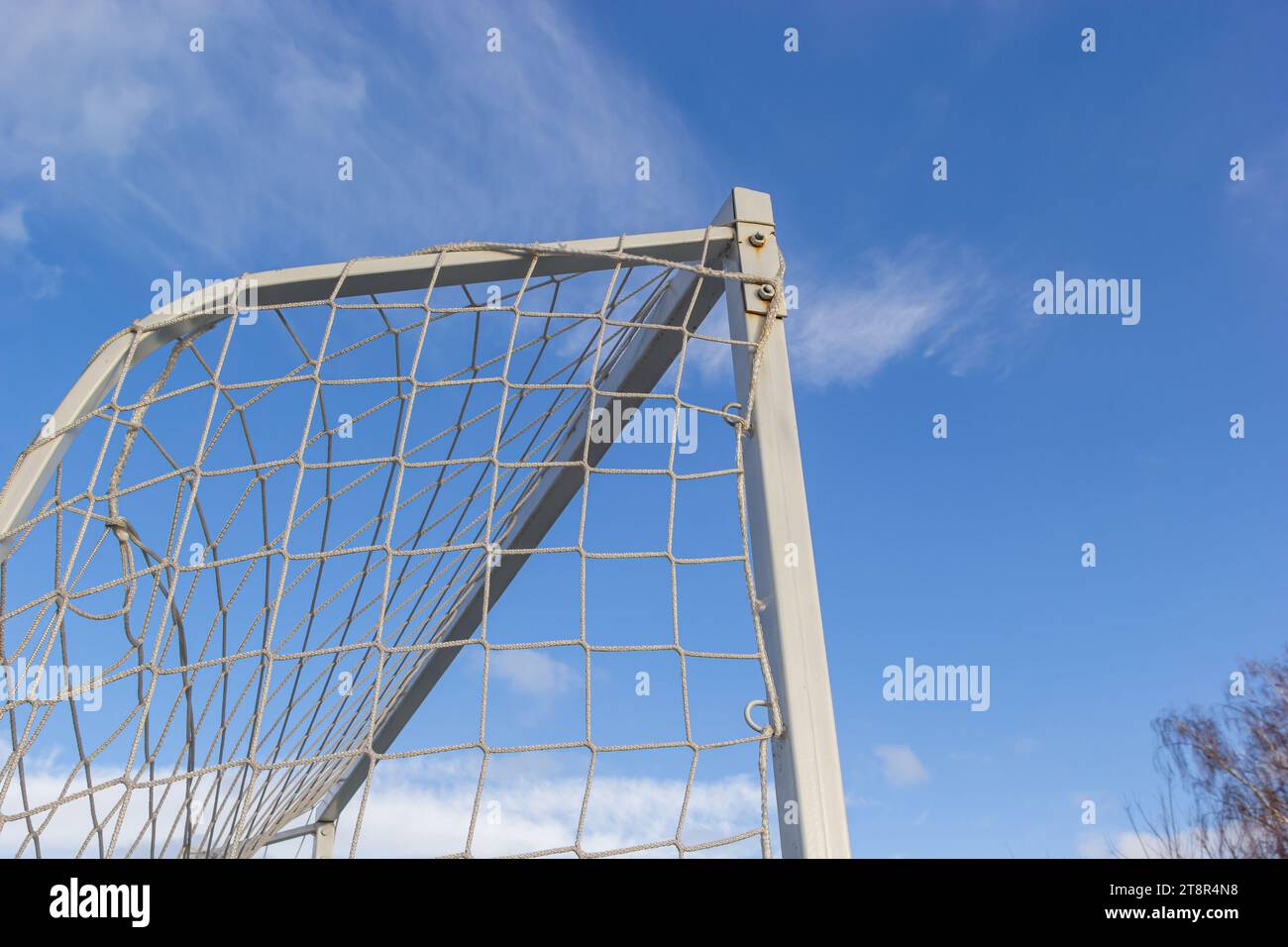 Corner of football goal. Triangle with Net of goal in soccer field at ...