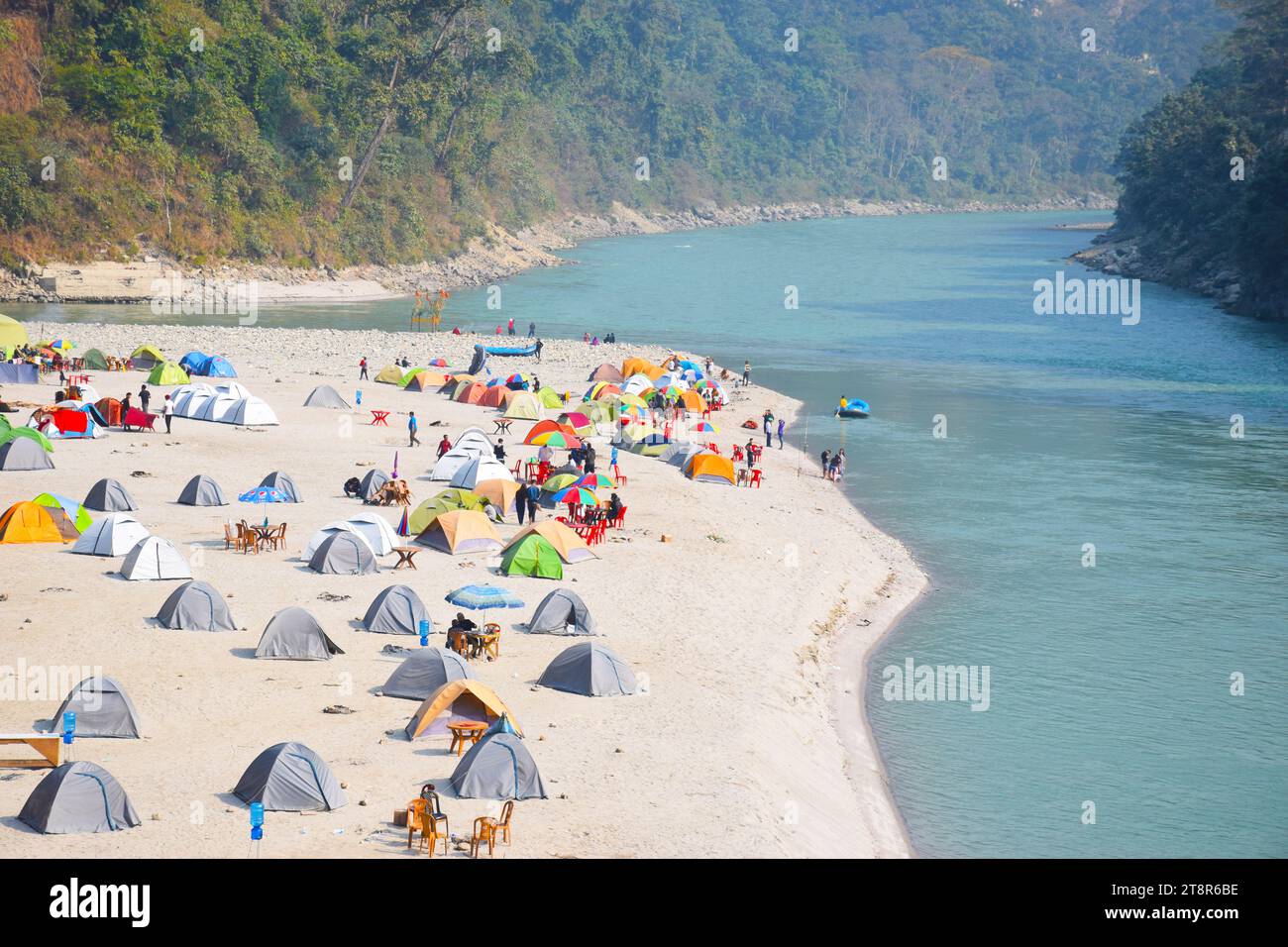 camping tent and river rafting Stock Photo - Alamy
