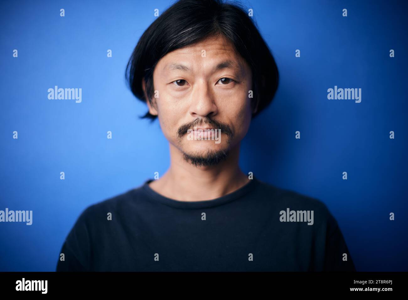 Japanese man studio portrait Stock Photo - Alamy