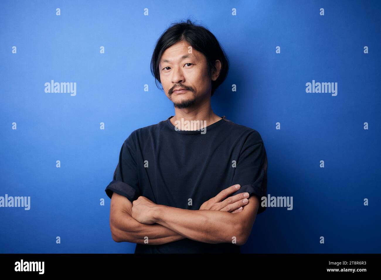 Japanese man studio portrait Stock Photo - Alamy