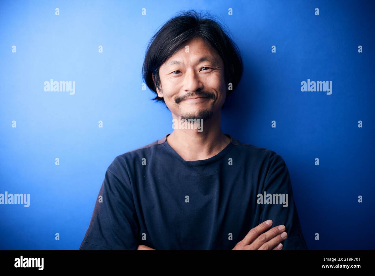 Japanese man studio portrait Stock Photo - Alamy