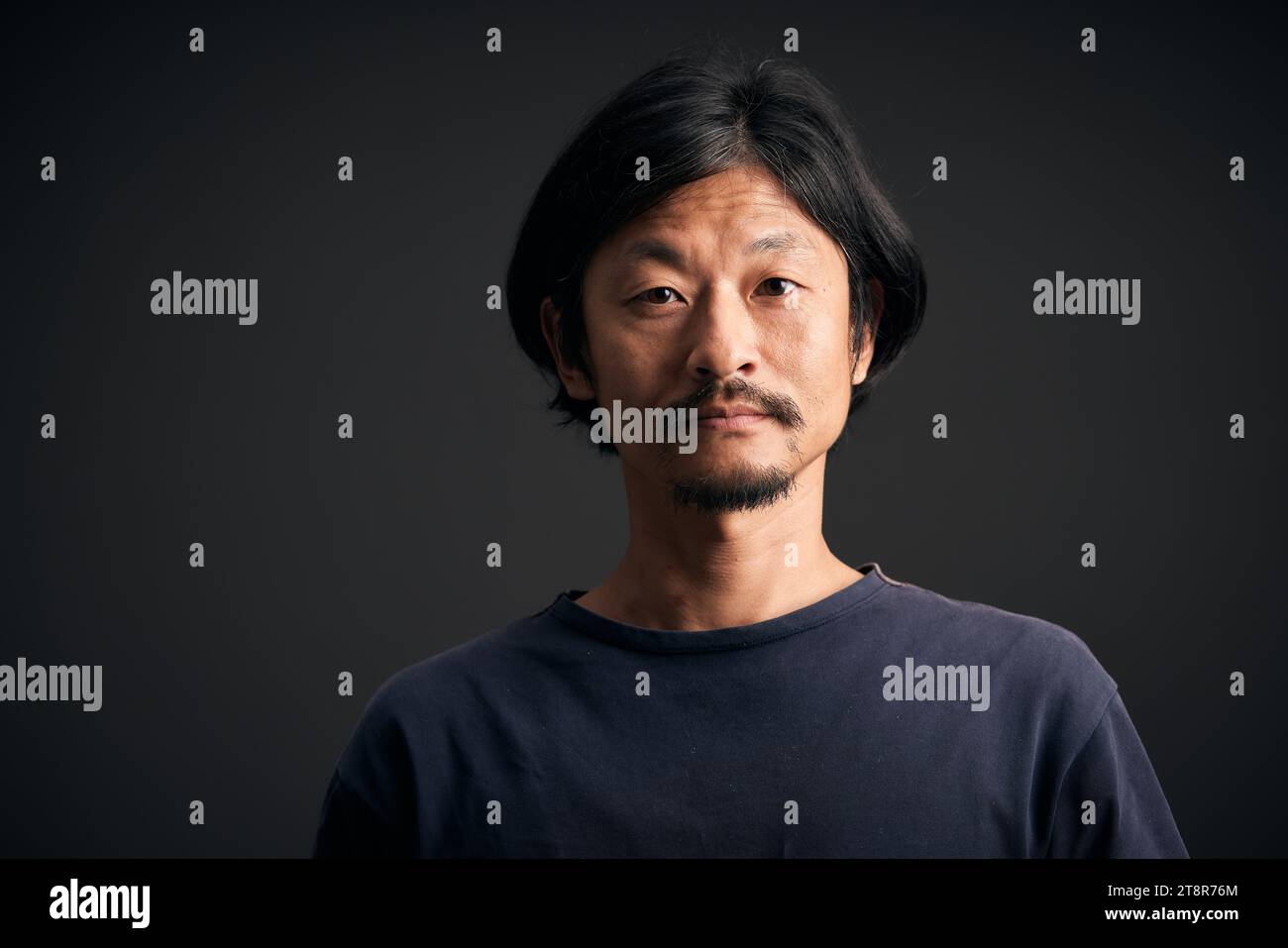 Japanese man studio portrait Stock Photo - Alamy