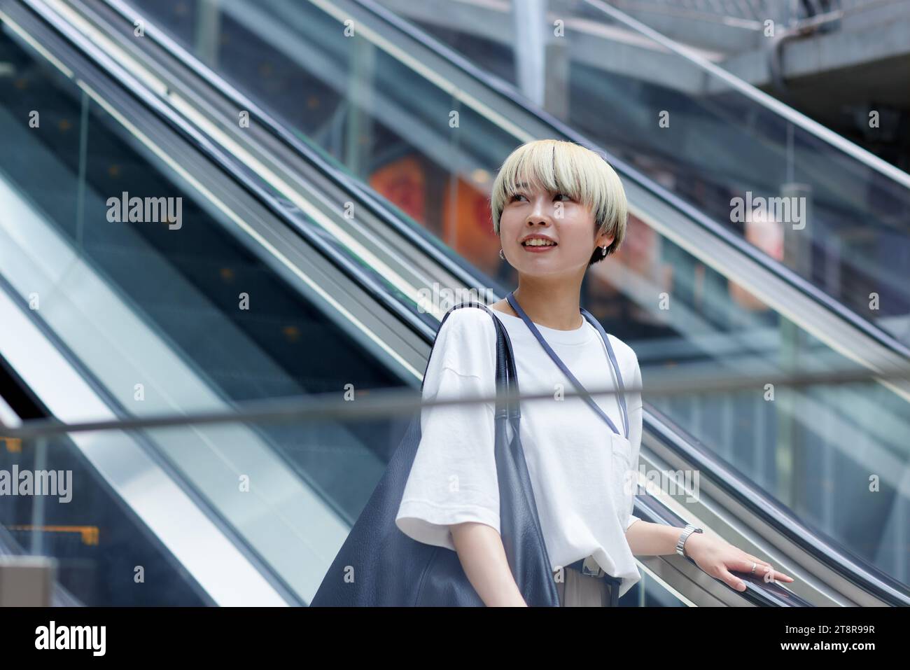 Young Japanese woman portrait downtown Tokyo Stock Photo - Alamy