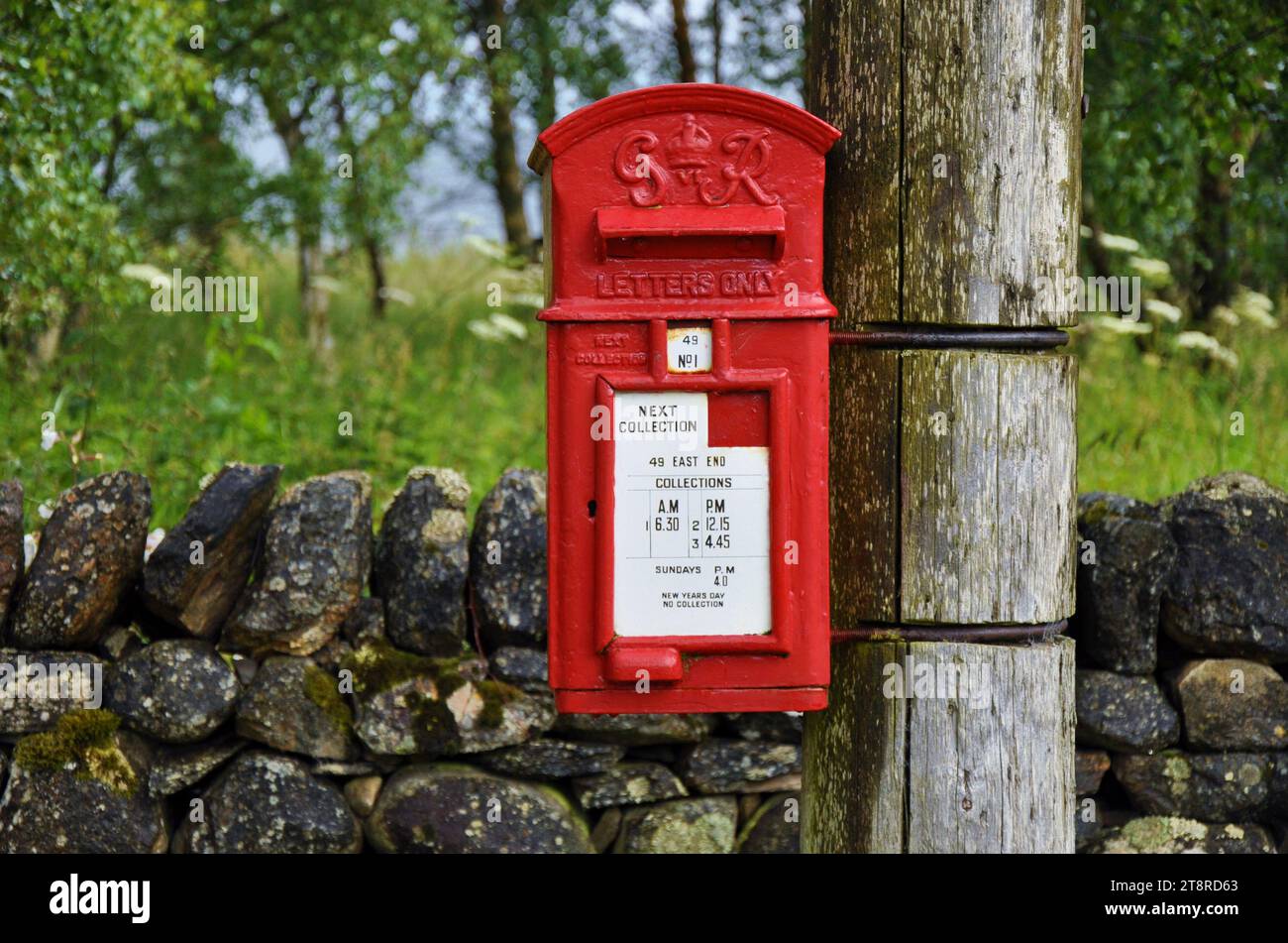 Pole mounted post box hi-res stock photography and images - Alamy
