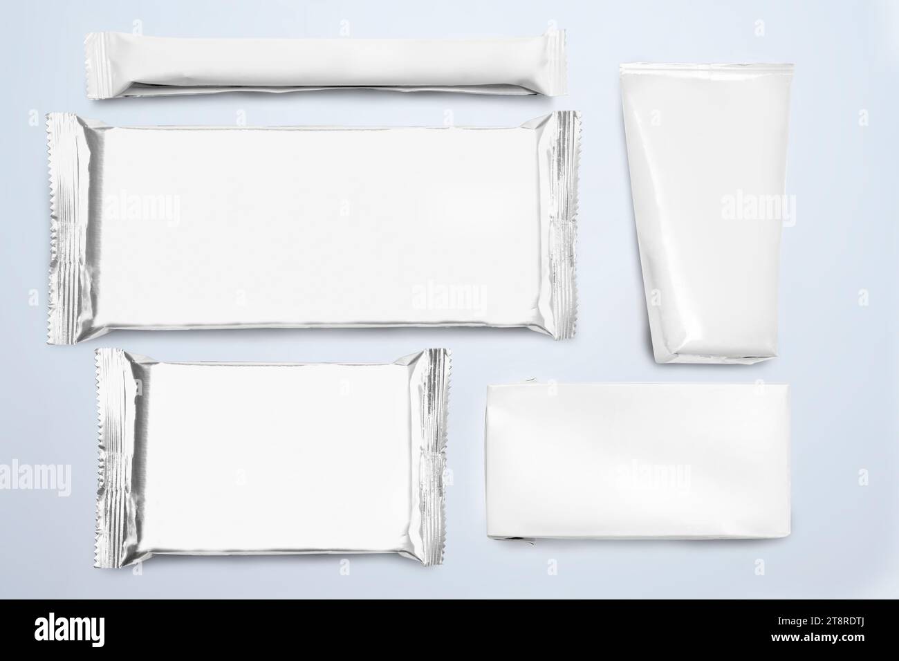 Variation of packaging product of snack on white background. Empty ...