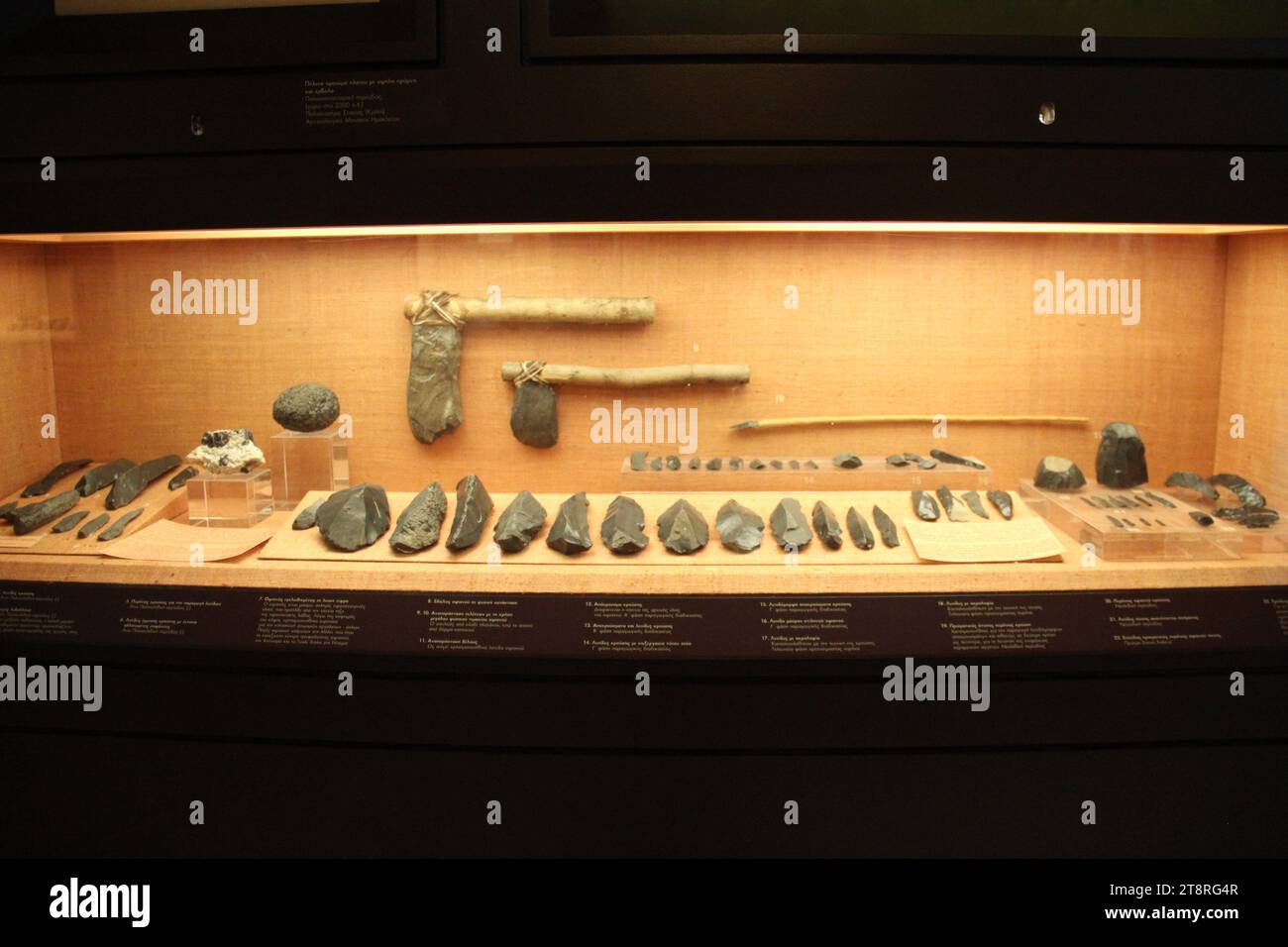 Hellenic war museum stone age weapons hi-res stock photography and ...