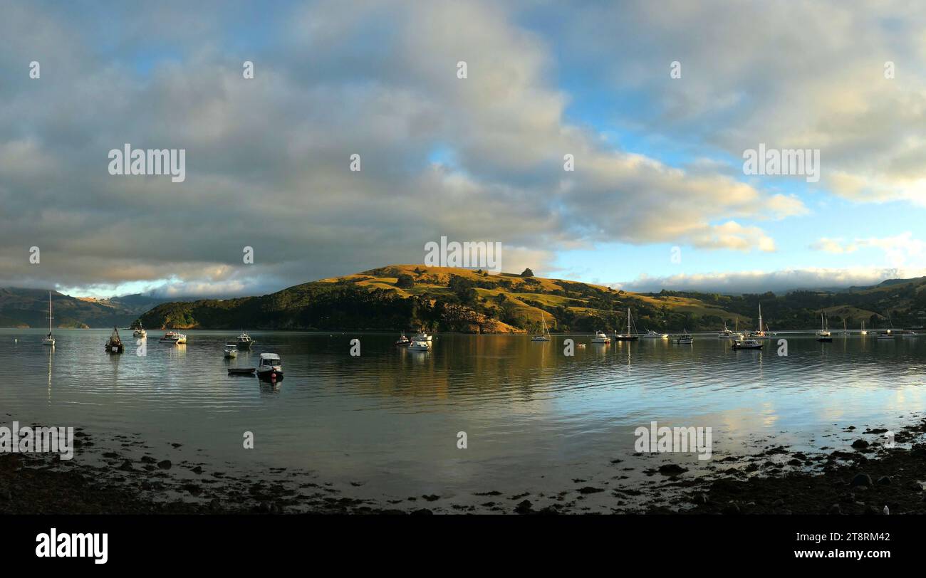 Dawn Akaroa harbour, Just 75 kilometres from the city of Christchurch ...
