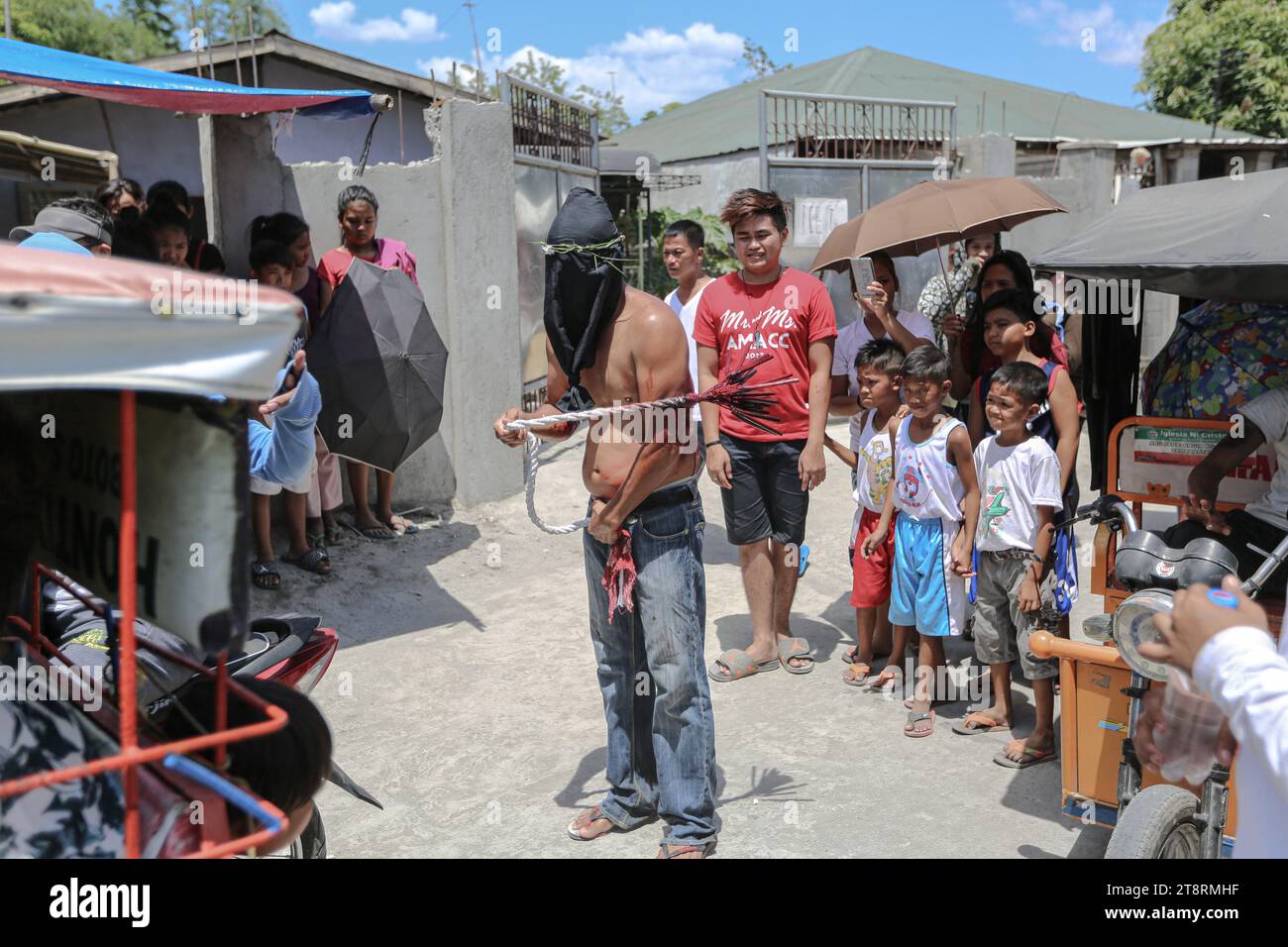 Bleeding flagellant parade in Philippines street for Holy Week and Good ...