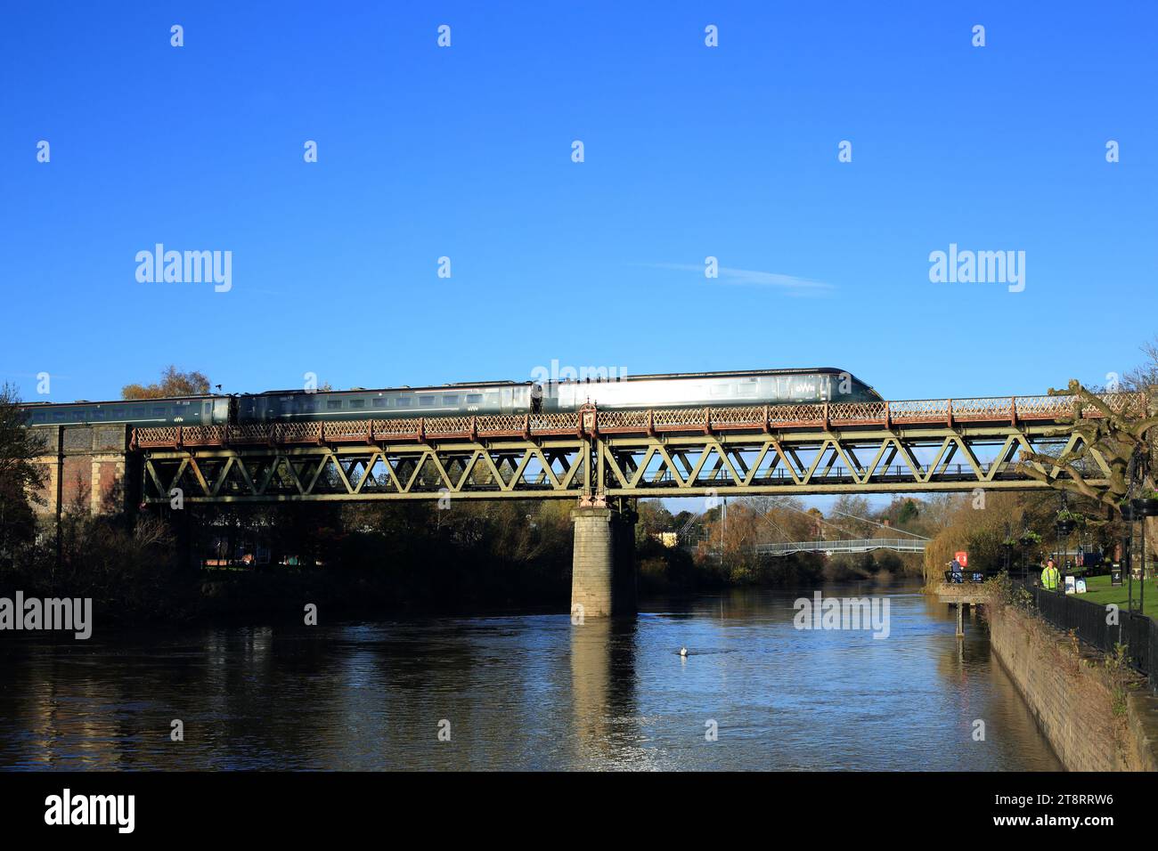 Train crossing the river Severn in Worcester, Worcestershire, England ...