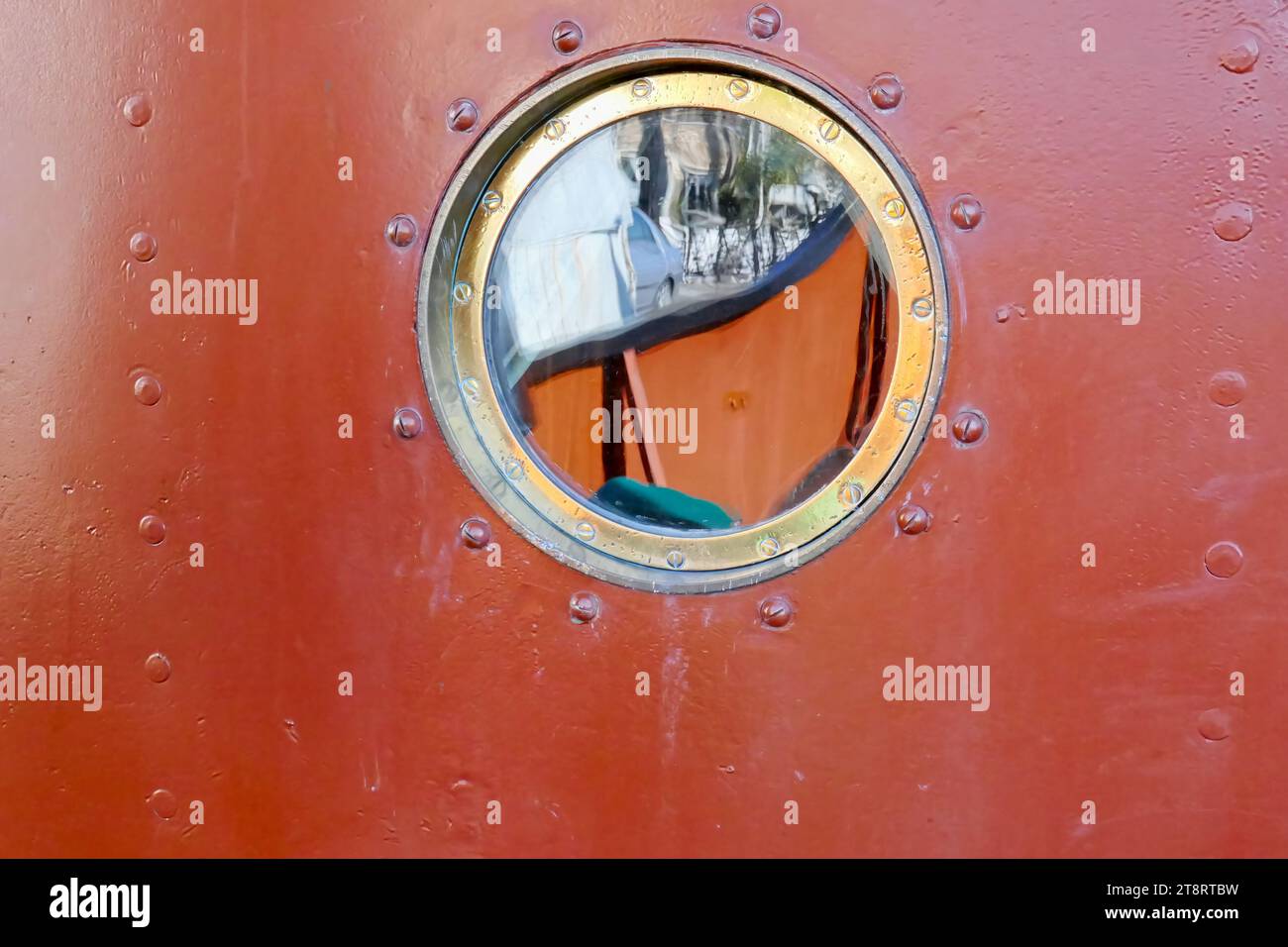 Closeup of round small porthole window on the side of vessel Stock ...
