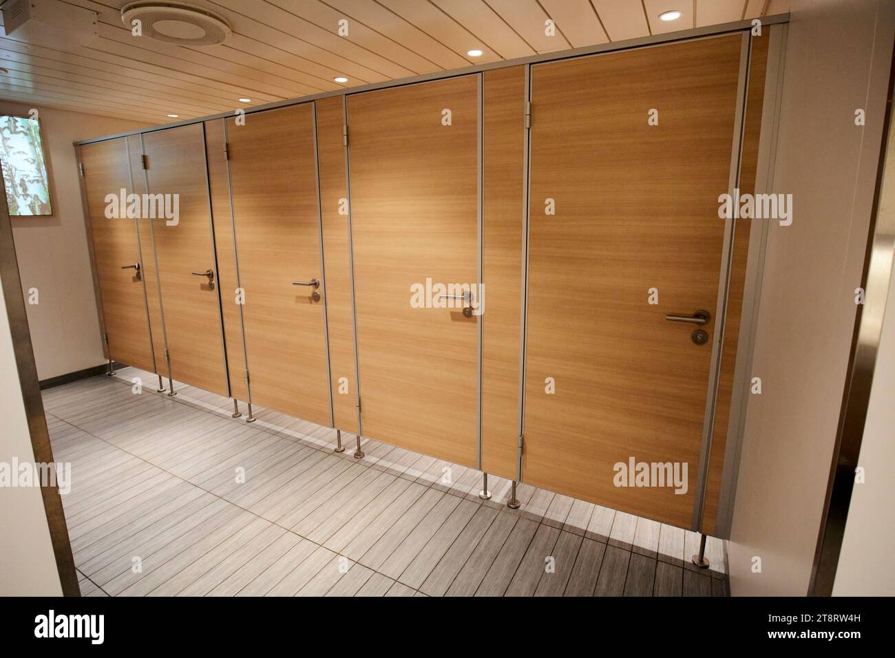 closed doors to toilet cubicles on board a stena line irish sea ferry ...