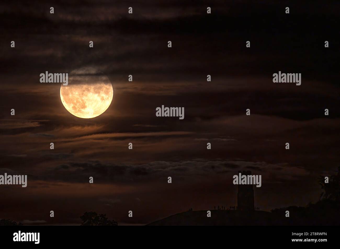 Full moon rising behind church hi-res stock photography and images - Alamy