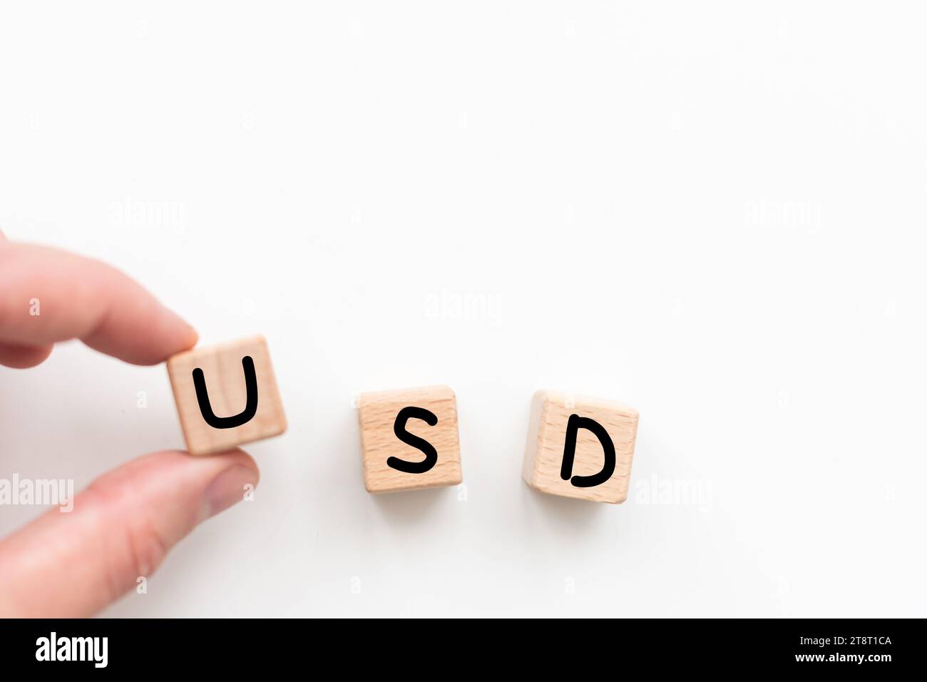 Word USD. Wooden small cubes with letters isolated on white background ...