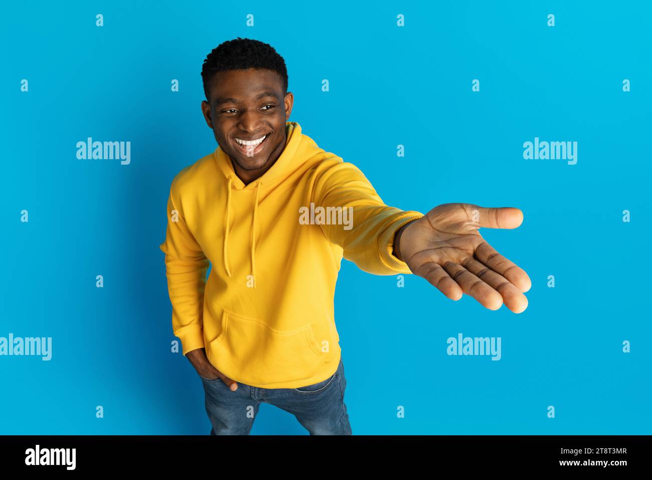 Emotional black guy holding hi-res stock photography and images - Alamy