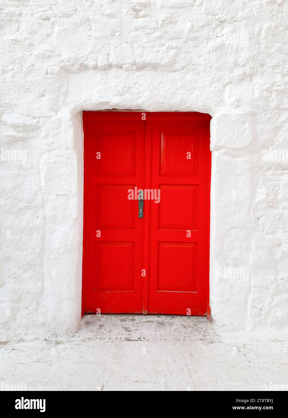 Door red color with mortise lock in house with white walls, Turkish ...