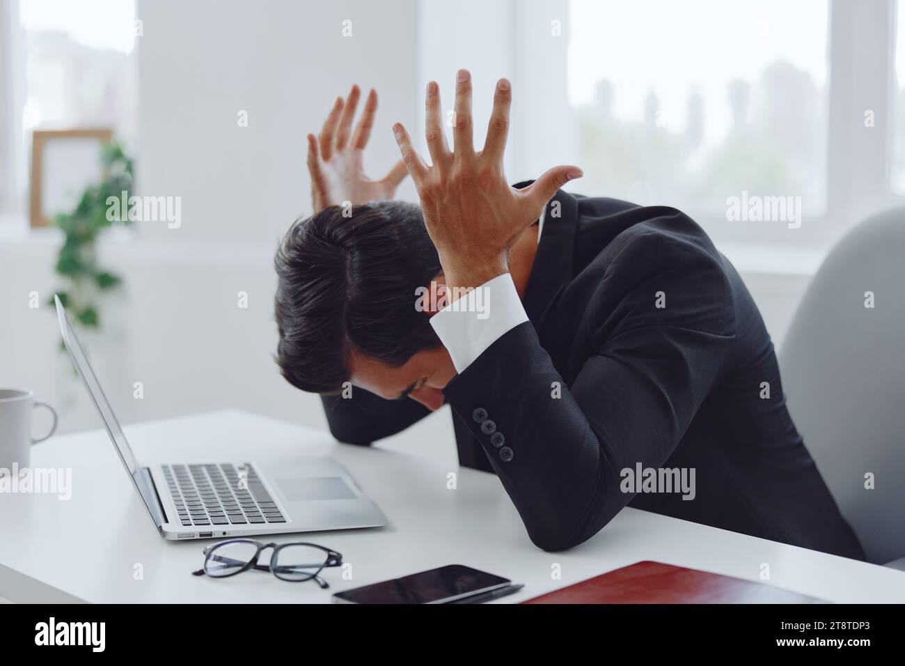 Sitting man tired thinking technology laptop working frustration ...