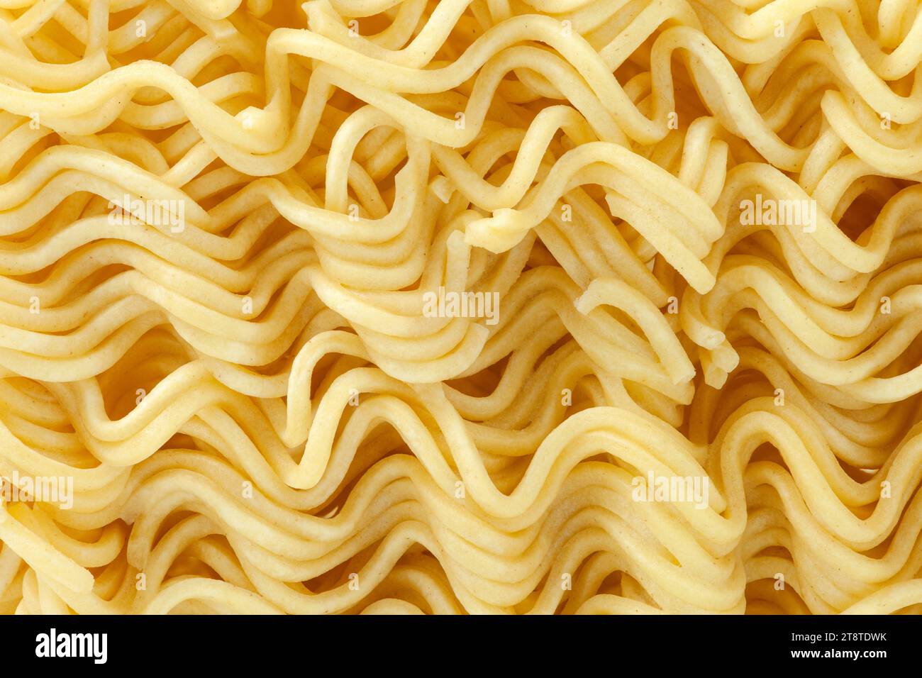 Instant noodles, raw, close-up, wavy structure, street food Stock Photo ...