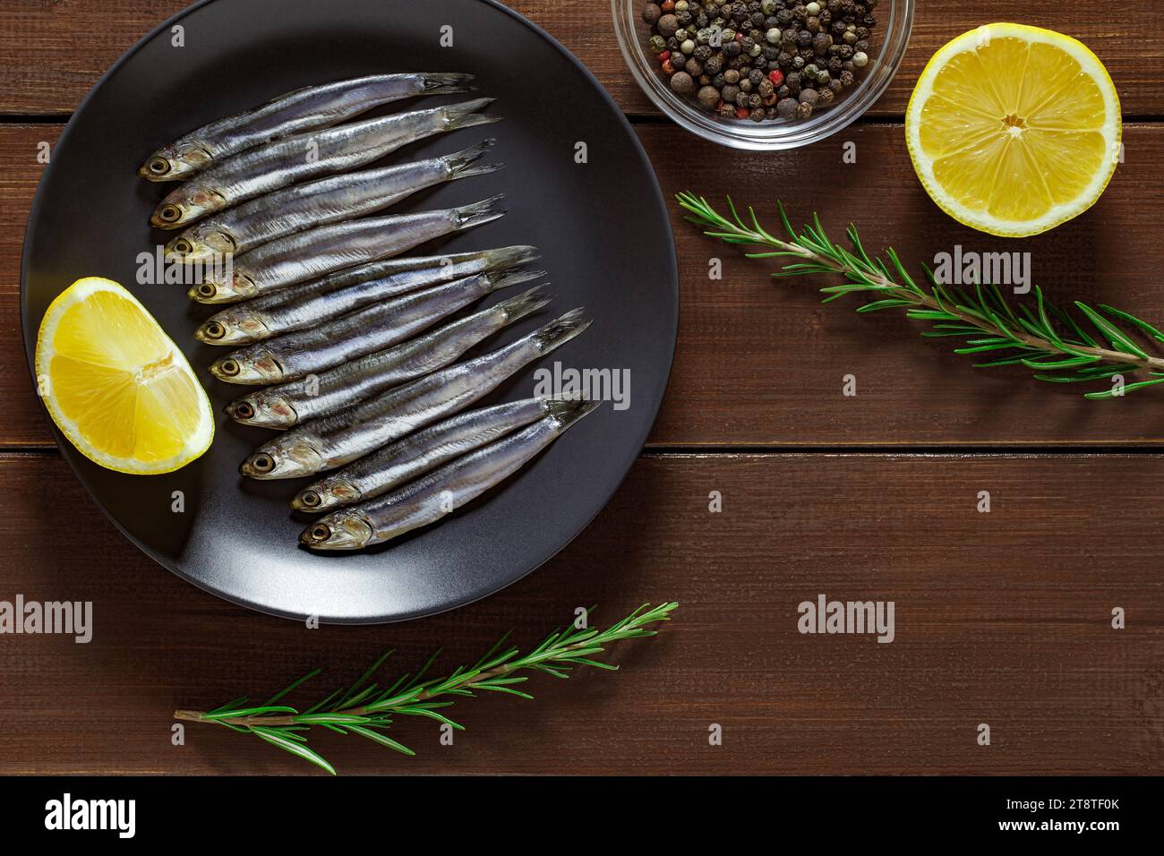 Anchovy european, hamsa fresh, several small fish laid out in row on ...