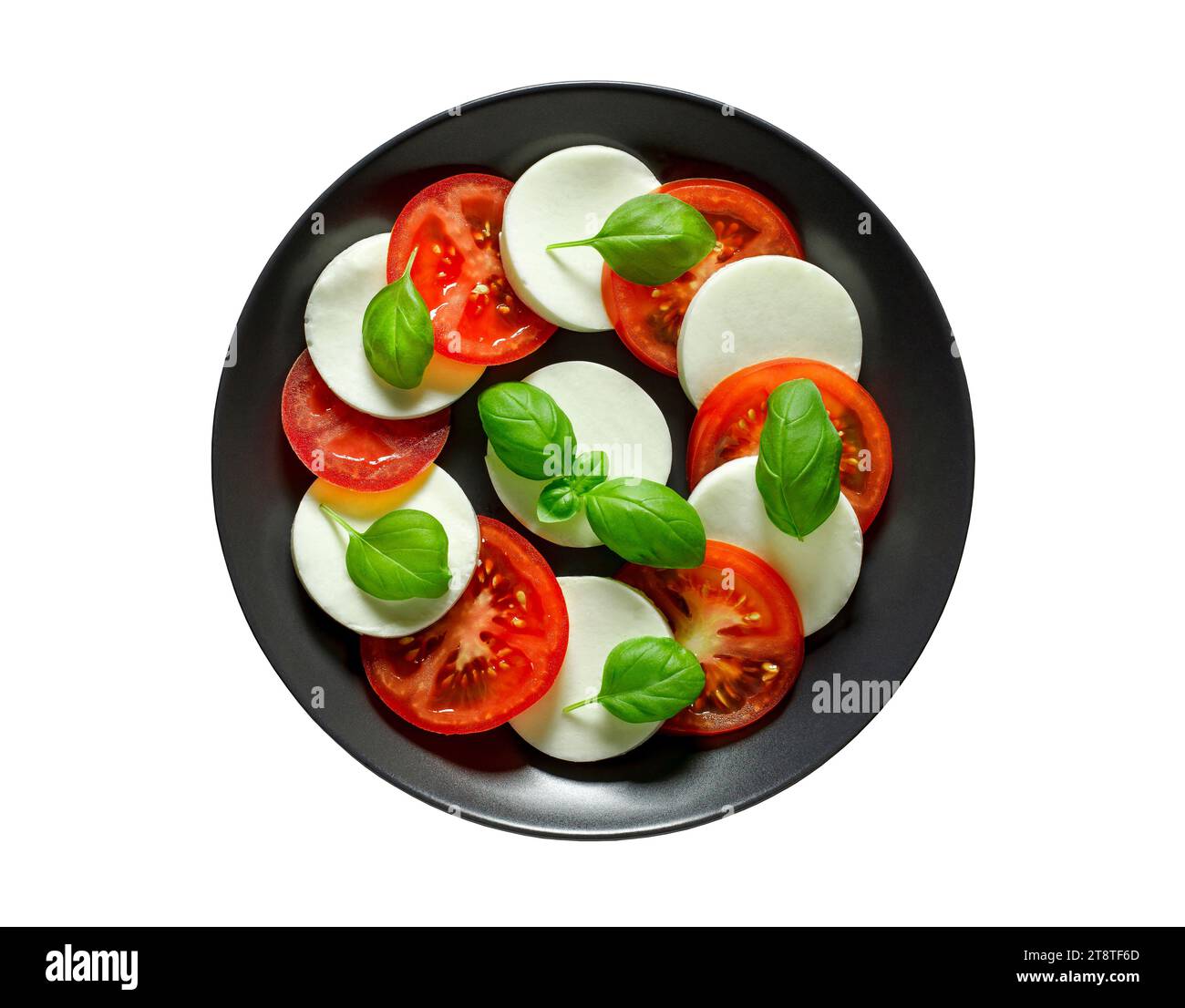 Caprese, Italian appetizer on dark gray plate, isolated on white ...