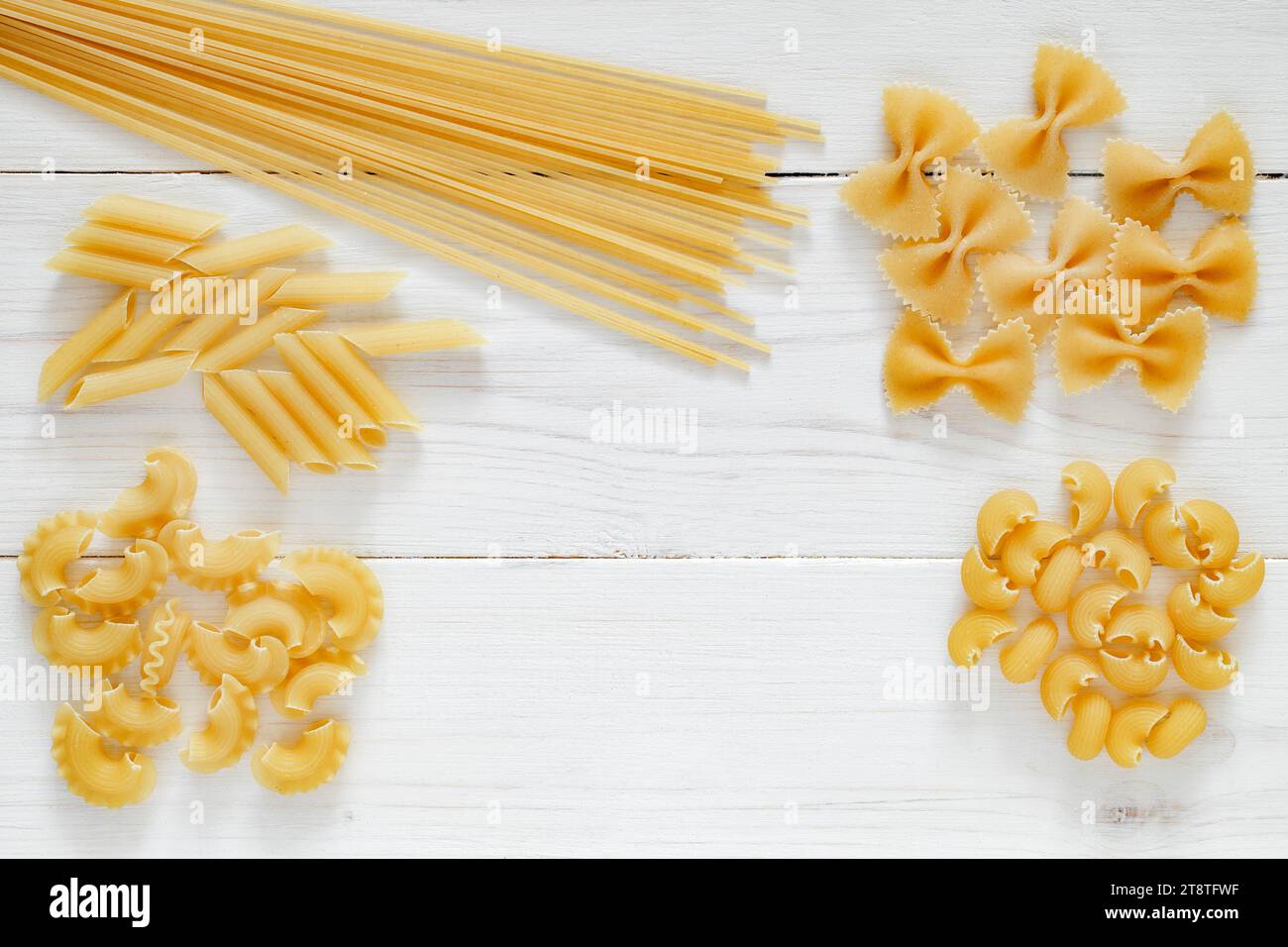 Pasta, set of raw farfalle, spaghetti, pipe, maccheroni, penne, cresta ...