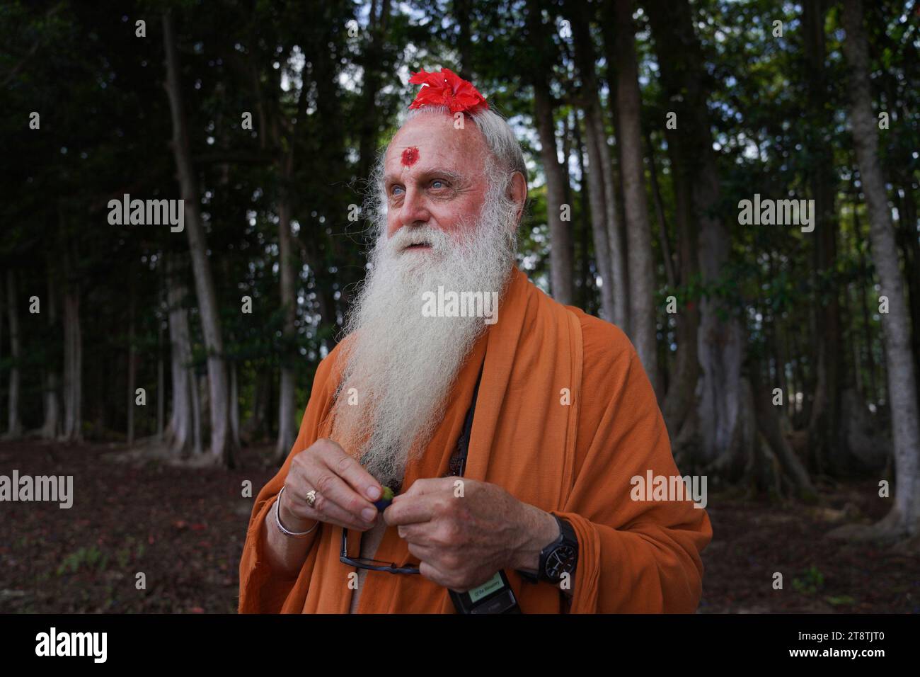 Paramacharya Sadasivanatha Palaniswami stands at the edge of the ...