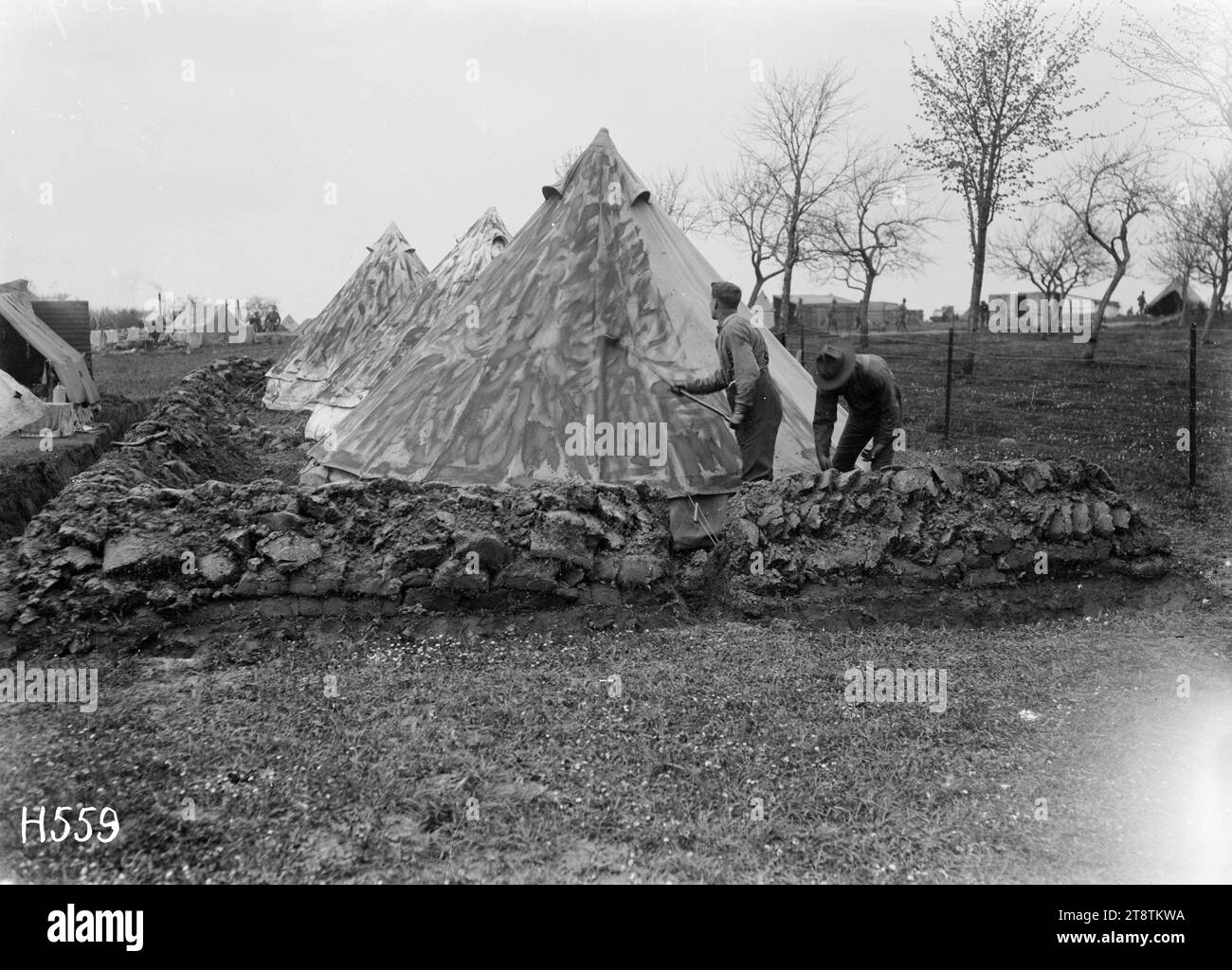 Camouflaging army tents during World War I, France, Army tents being ...