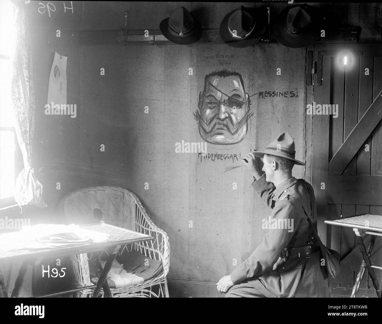 The New Zealand unofficial cartoonist, Lt G. Pat Hanna, beside his ...