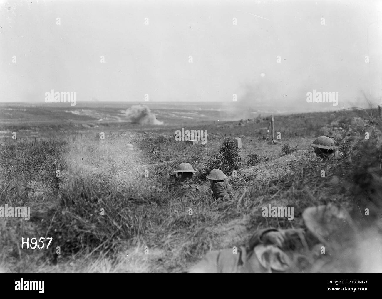 New Zealand troops in shell hole positions during shelling by German ...