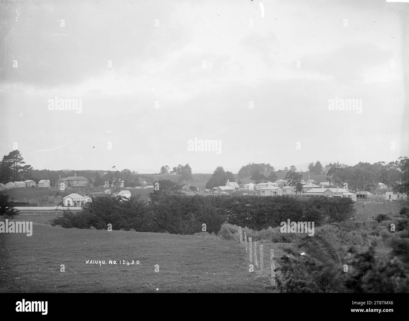 Waiuku, View looking across fields to the town of Waiuku Stock Photo ...