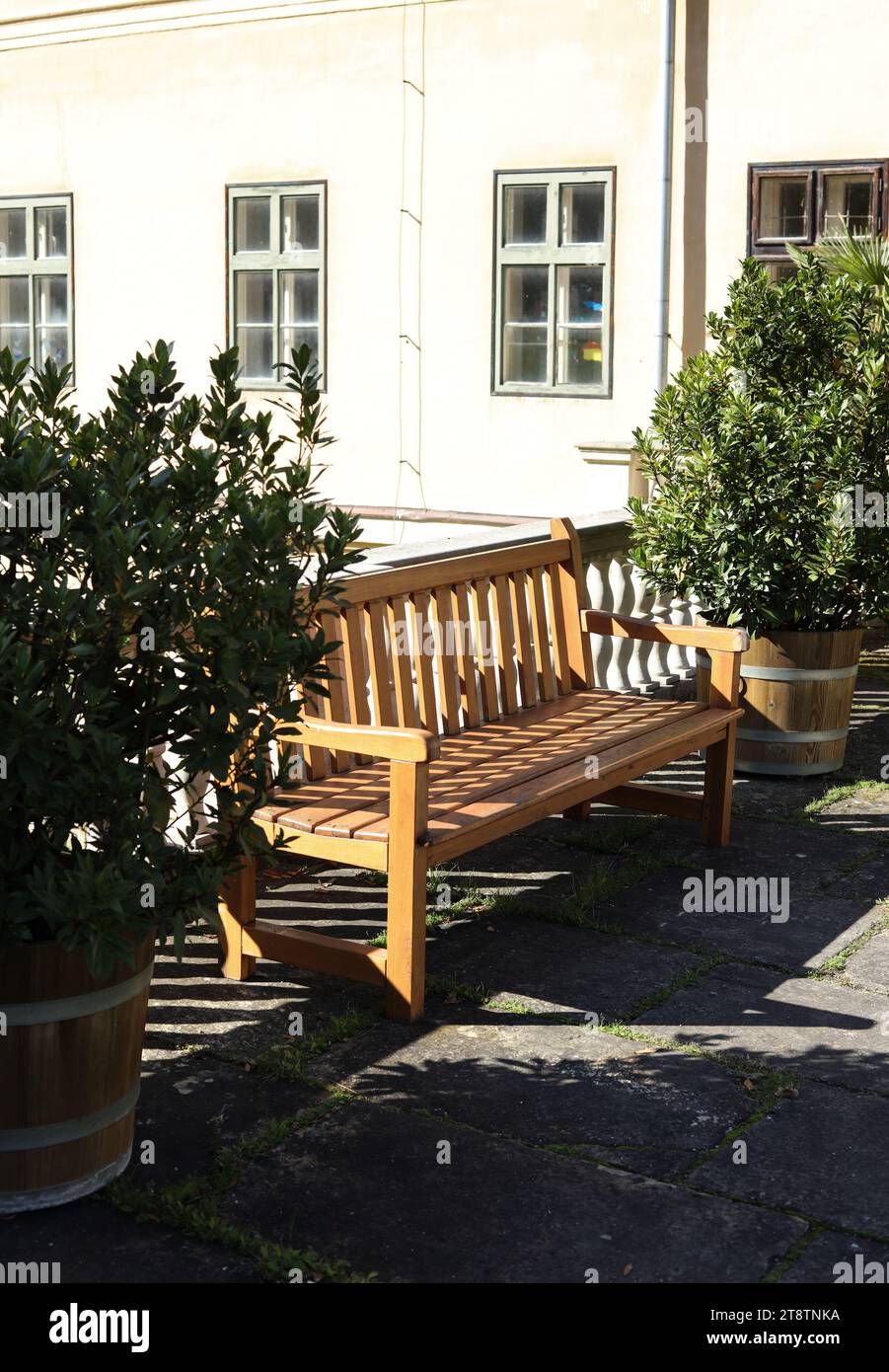 an outdoors wooden bench on the balcony Stock Photo - Alamy