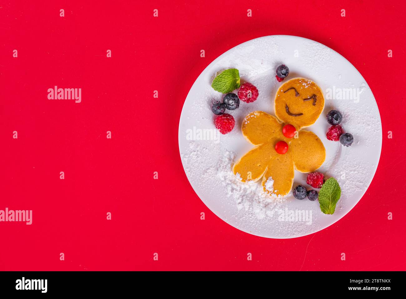 Funny Christmas breakfast pancake in form of Christmas symbols ...