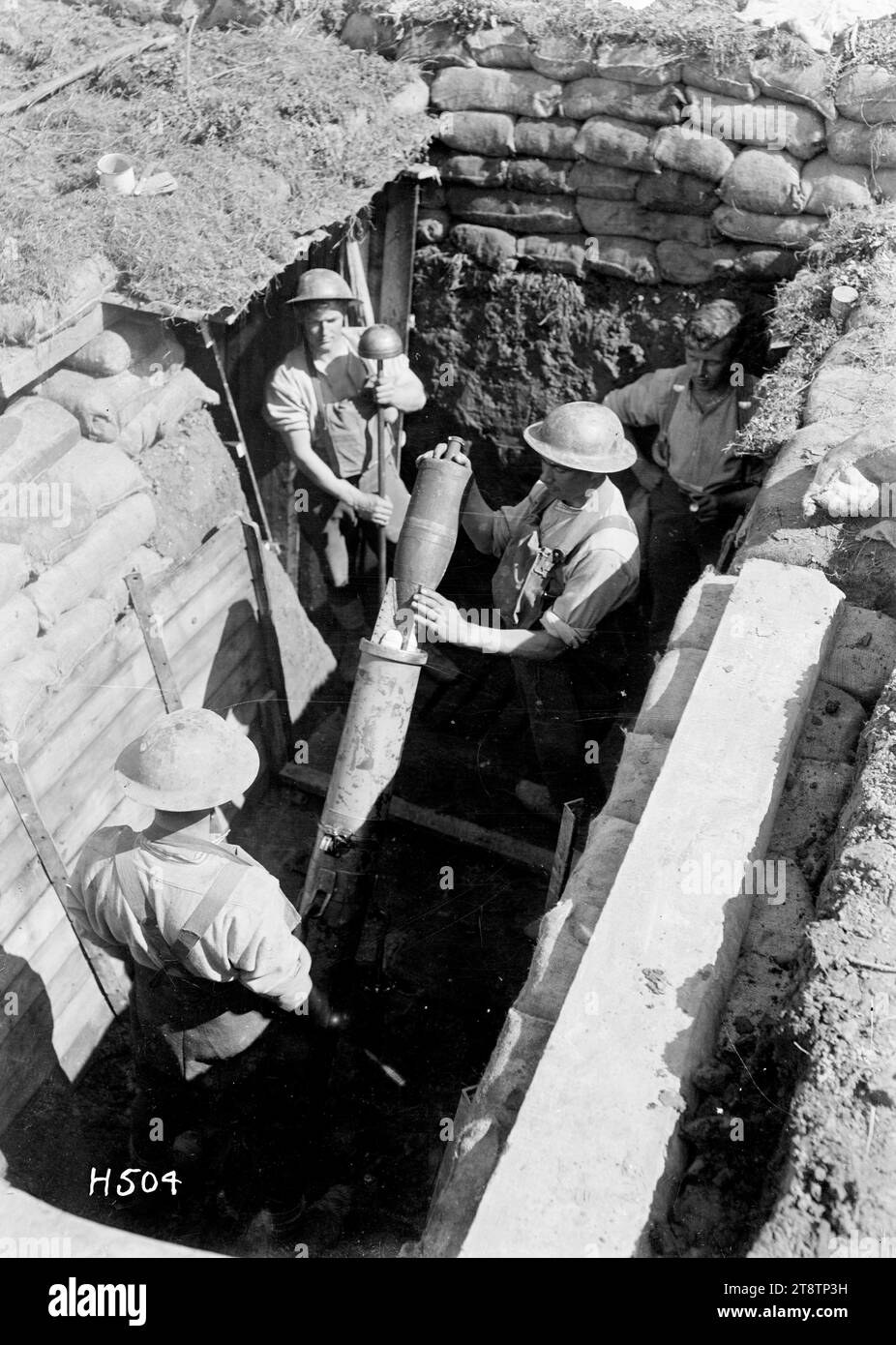 Soldiers loading a New Zealand trench mortar, near Colincamps, France ...