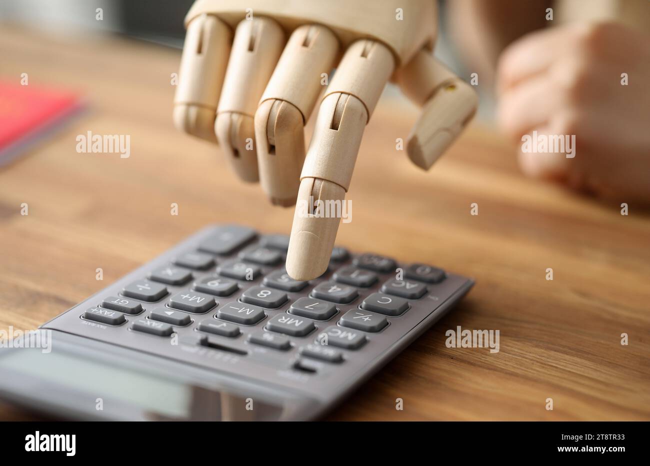 Calculator on wooden desk Stock Photo - Alamy
