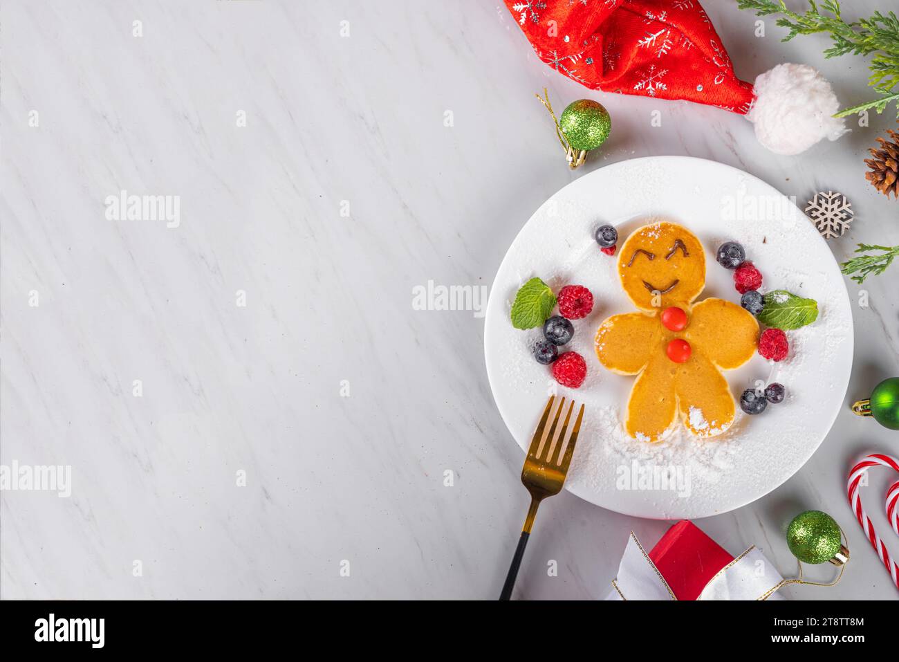 Funny Christmas breakfast pancake in form of Christmas symbols ...