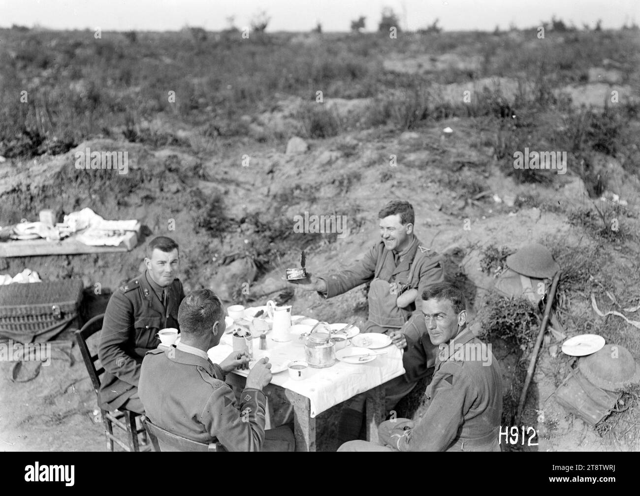 New Zealand officers eating breakfast in captured German trenches, New ...