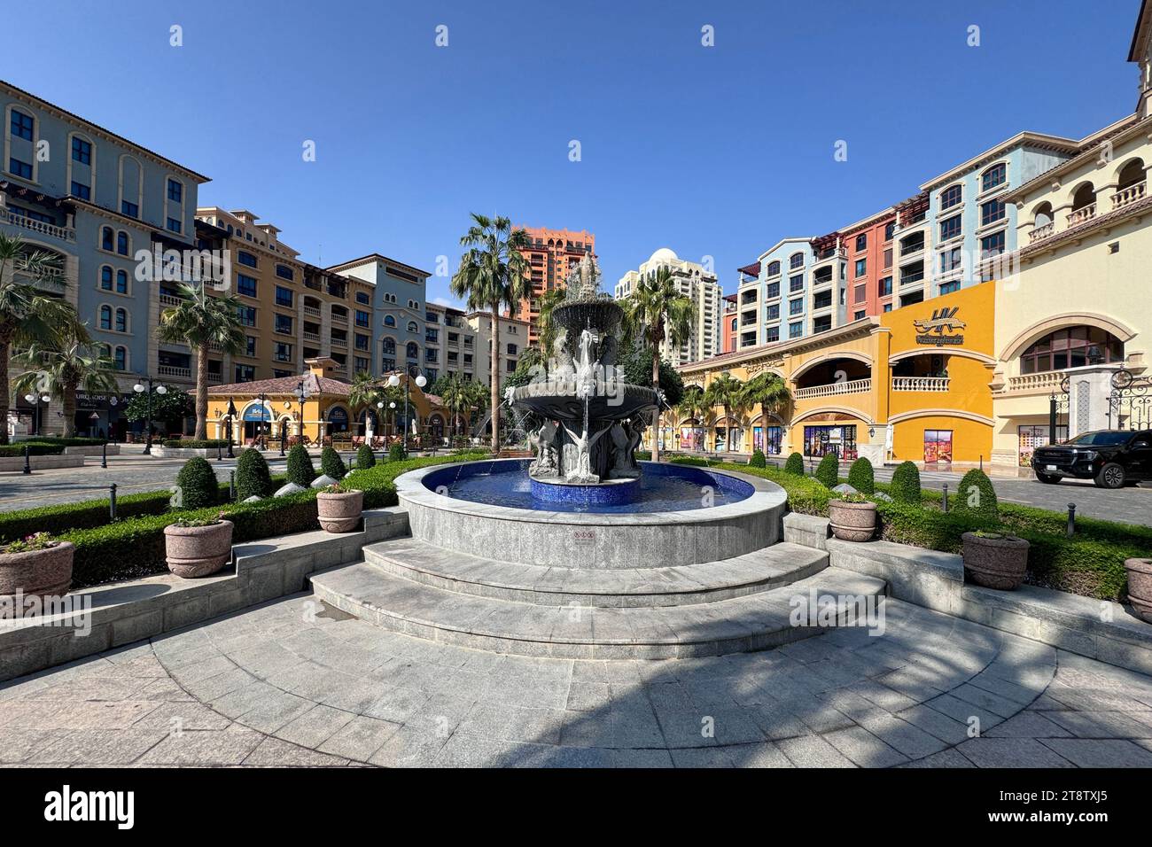 Public square with water fountain on the Medina Centrale Pearl Qatar ...