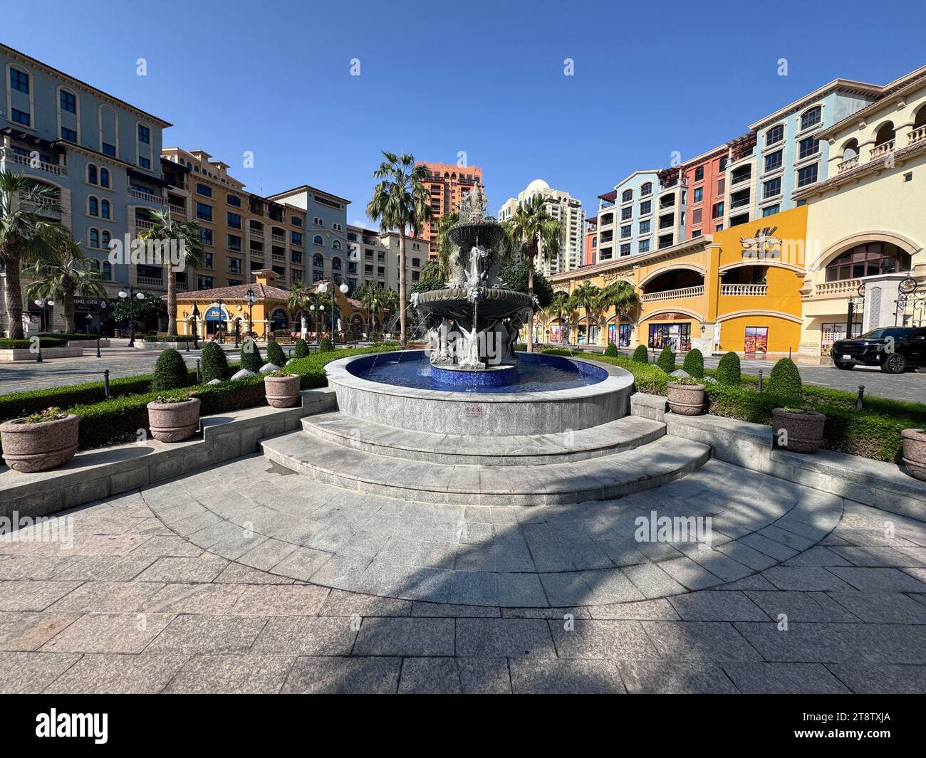 Public square with water fountain on the Medina Centrale Pearl Qatar ...
