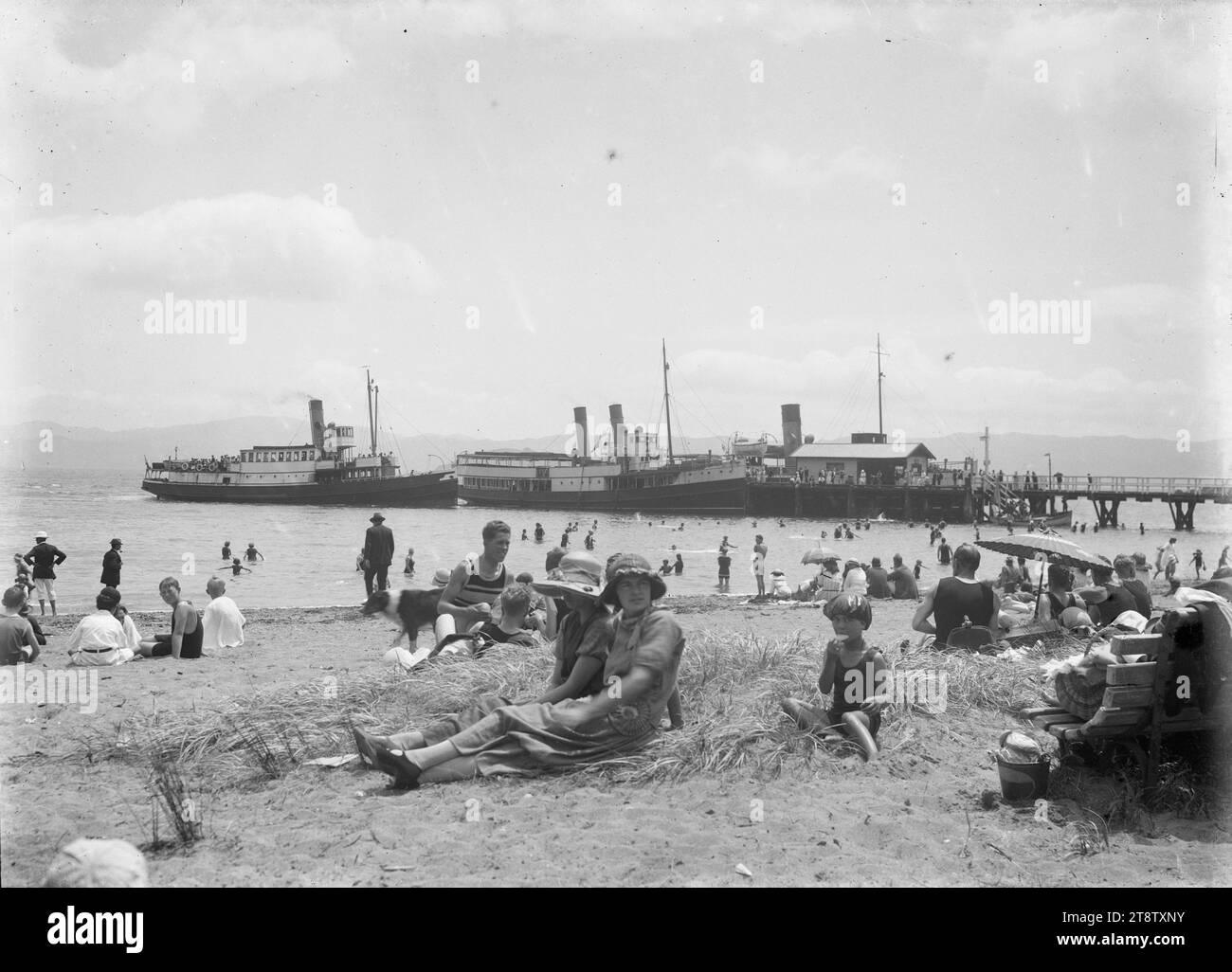 Days Bay, Eastbourne, showing people on the beach, ferry boats and the ...
