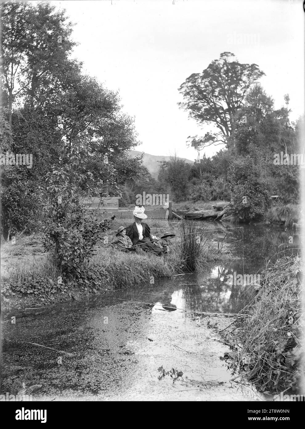 Lydia Williams and her sons fishing, Dunedin, 1897 Stock Photo - Alamy