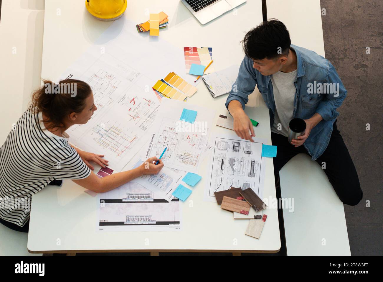 Engineer discussing over document hi-res stock photography and images ...