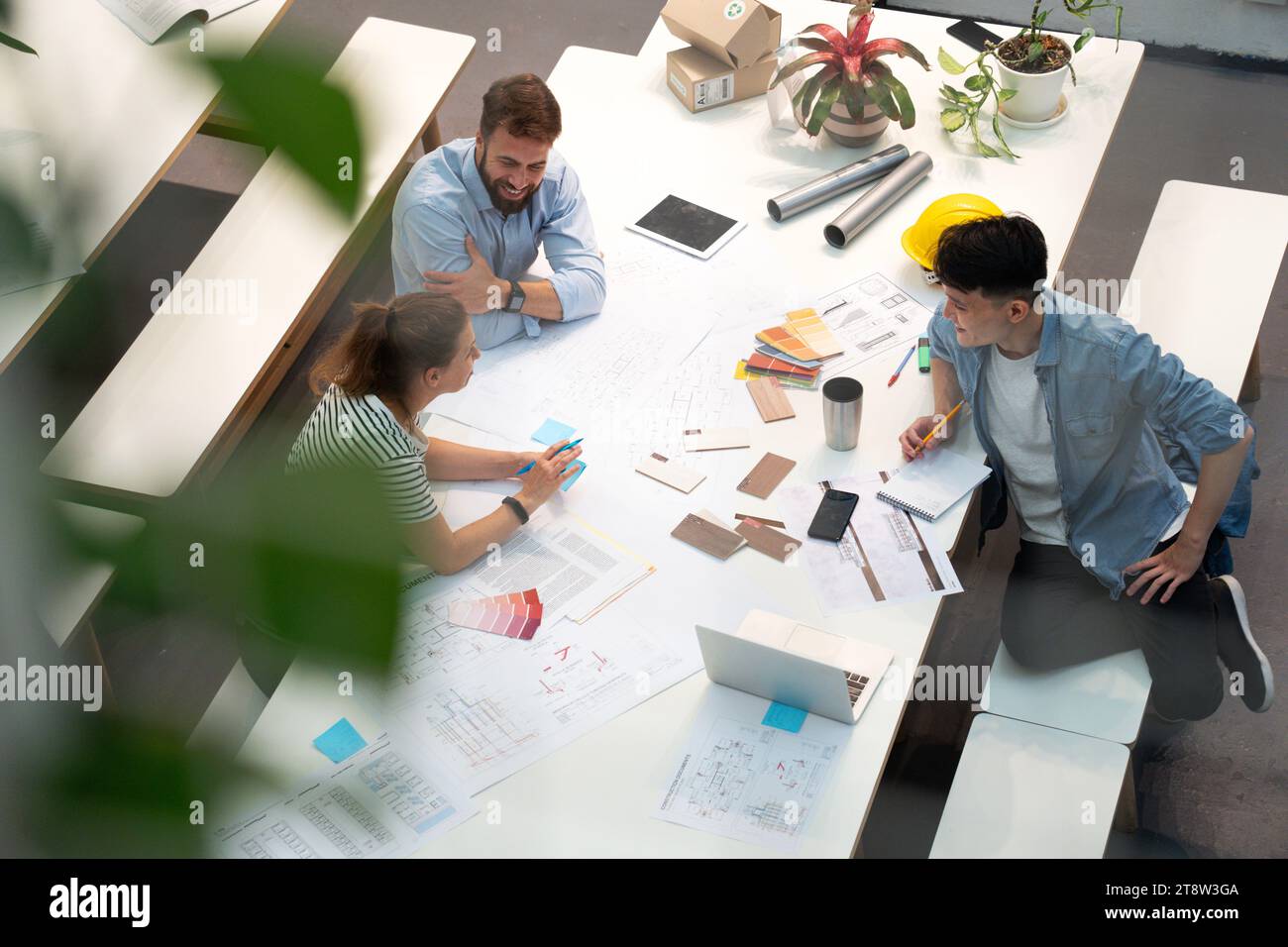 Group of architects and civil engineer discussing project Stock Photo ...