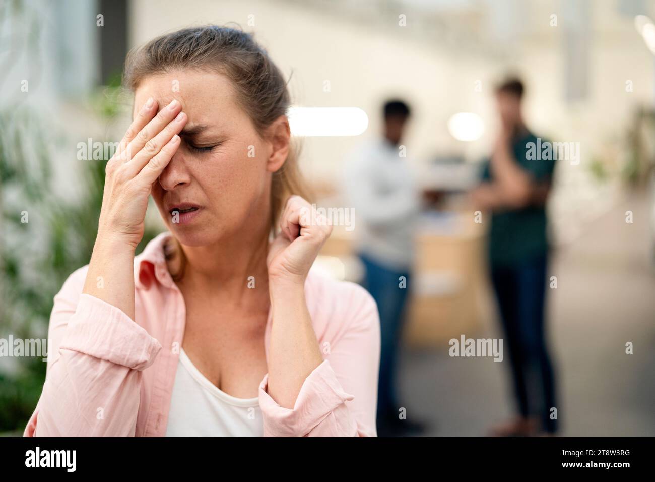 Female office worker headache hi-res stock photography and images - Alamy