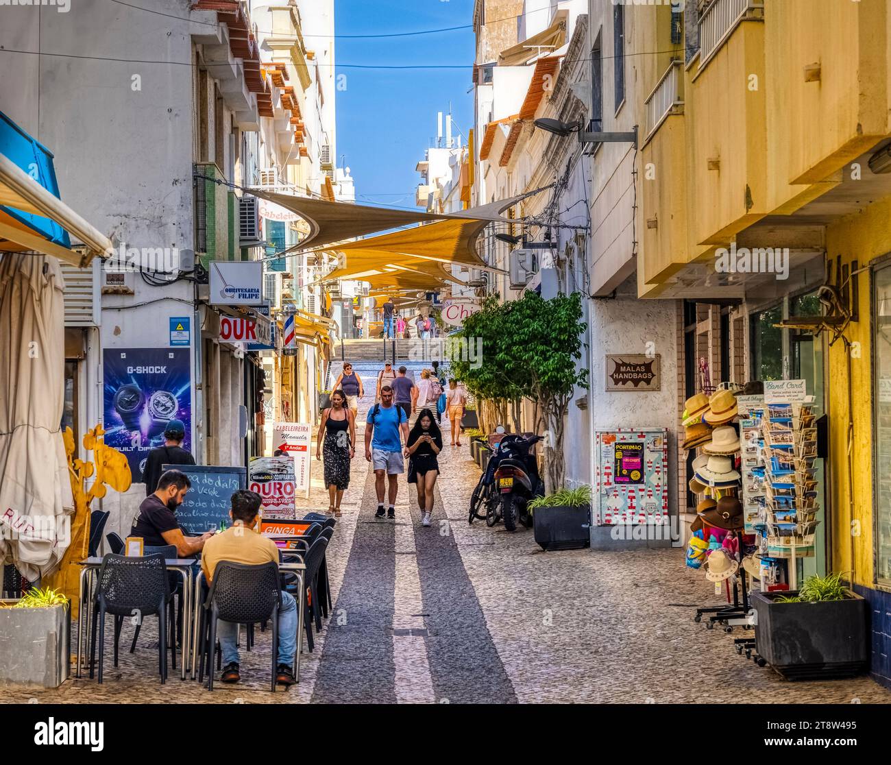 Outdoor cafe in the old town area of Portimao in the Faro District of ...