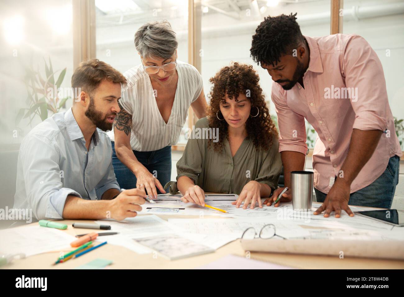 Group people working blueprint in hi-res stock photography and images ...