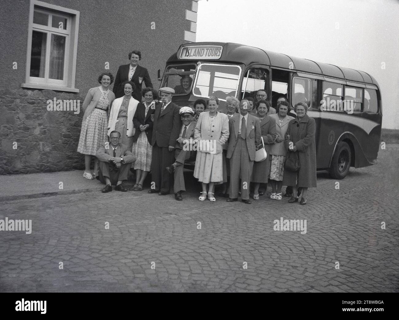 1950s, historical, a group of adults on an excursion on Guernsey ...