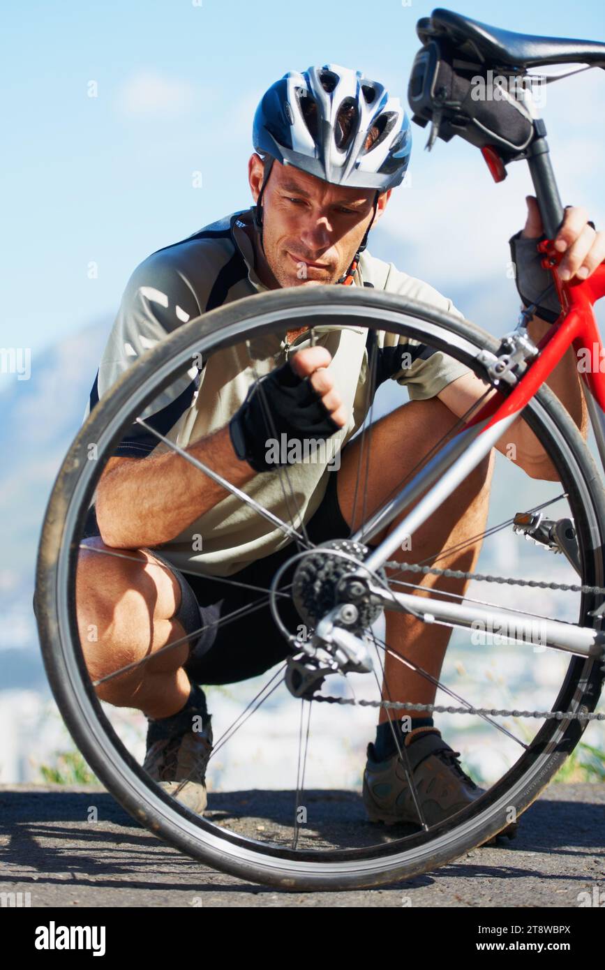 Check, wheel and man with bicycle on road, street and outdoor exercise ...