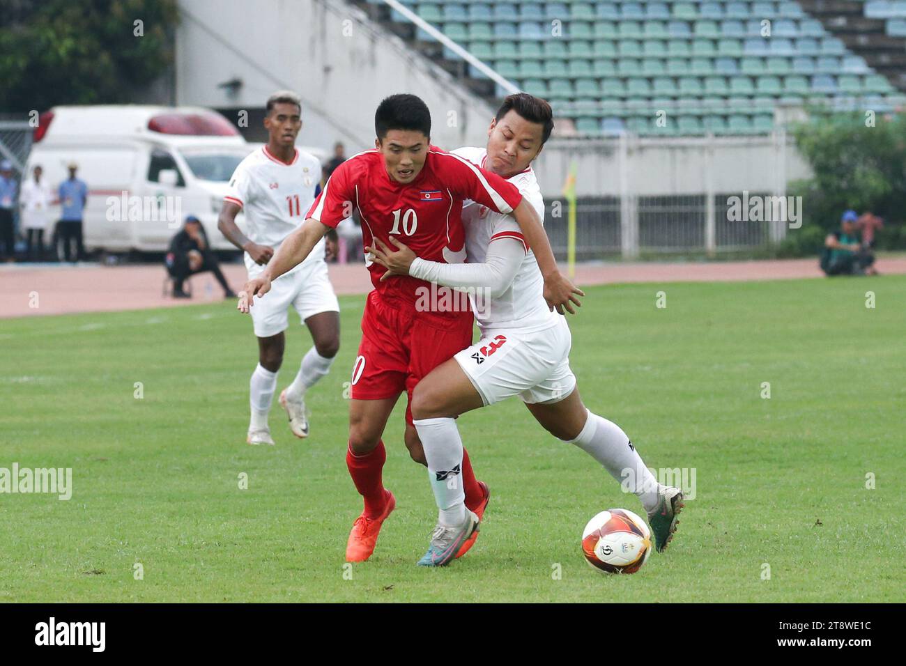 Yangon, Myanmar. 21st Nov, 2023. Han Kwang Song (L) of DPR Korea vies ...