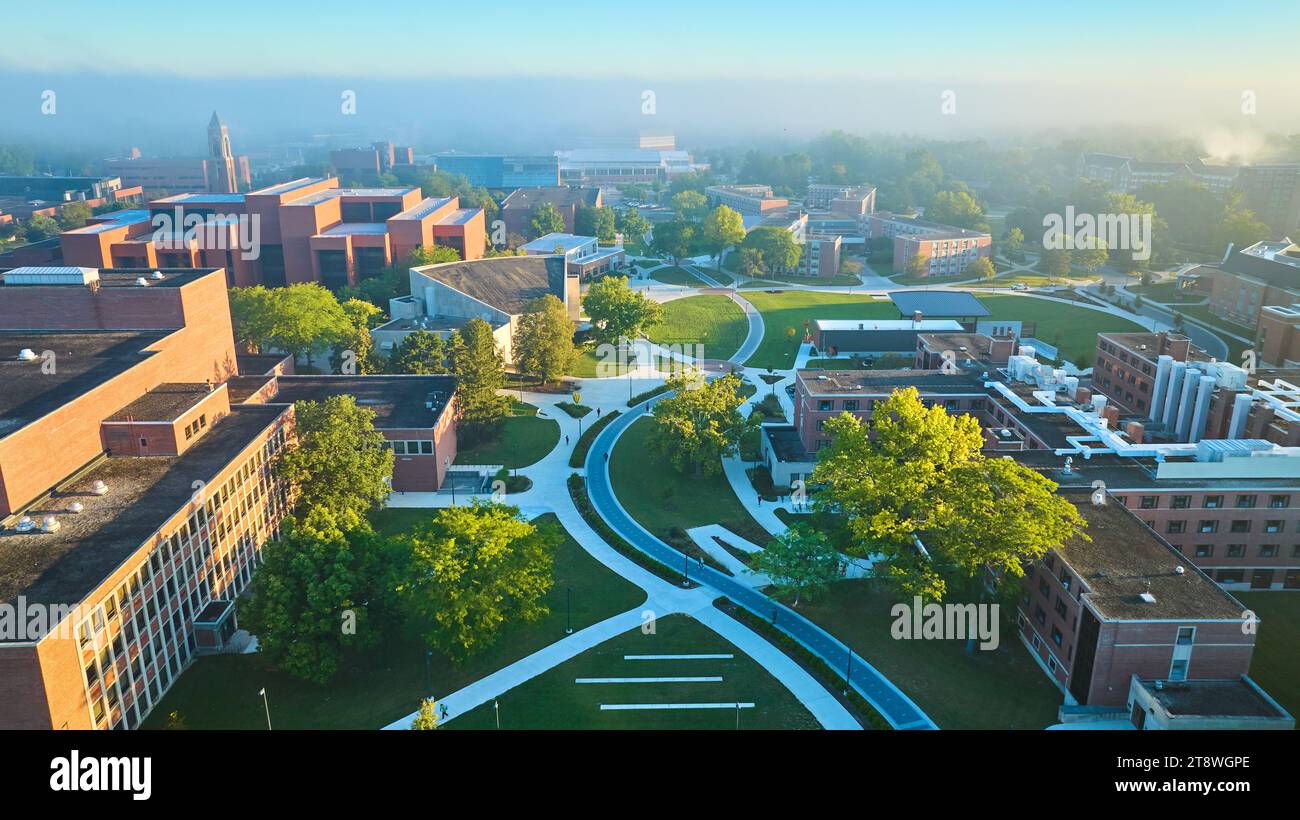 Ball State University campus aerial misty golden morning sunrise over ...